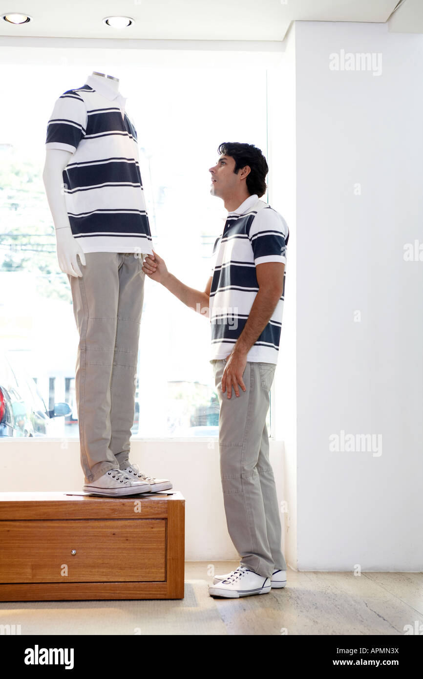 Identical clothes hi-res stock photography and images - Alamy