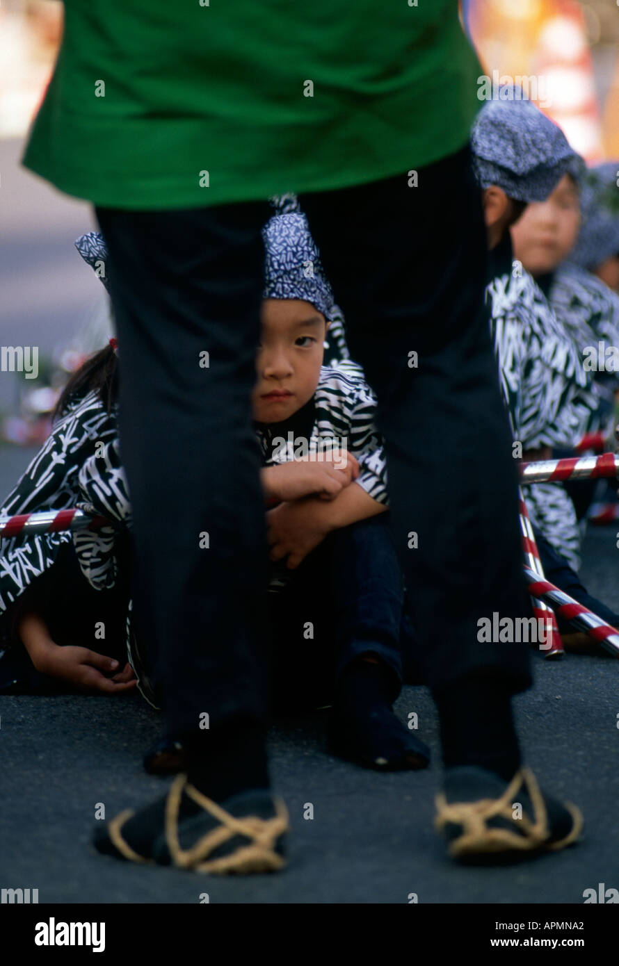 Boy looking through legs hi-res stock photography and images - Alamy