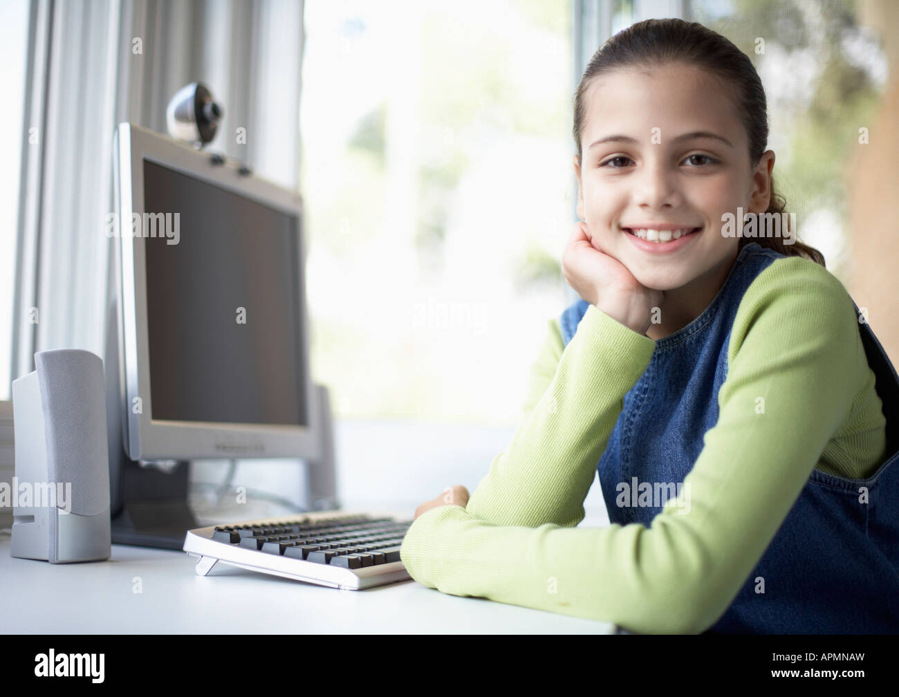 Girl by computer (portrait Stock Photo - Alamy