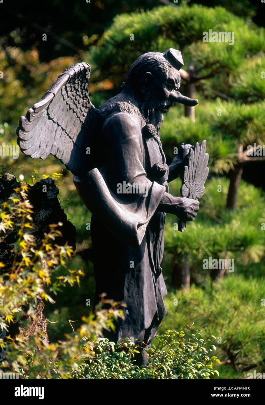 Statue of mythical Japanese river sprite, karasu tengu Stock Photo - Alamy