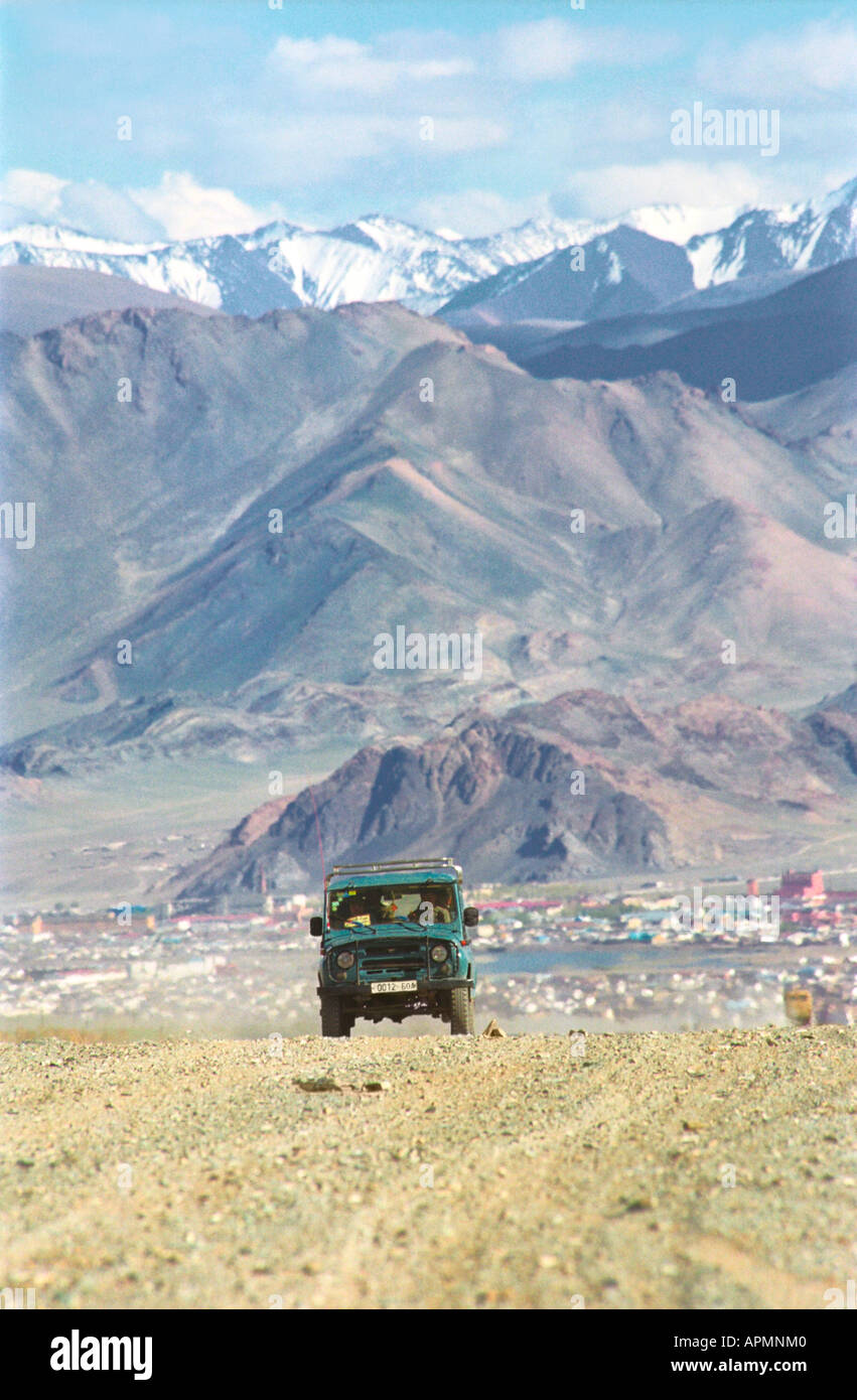 Off-road vehicle climbing the pass on the Mongolian Federal Highway ...