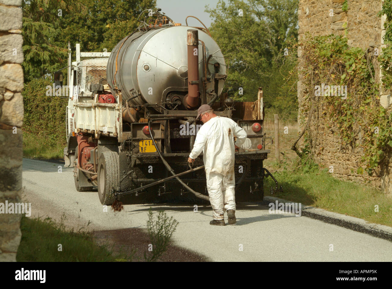 Spraying tar hi-res stock photography and images - Alamy
