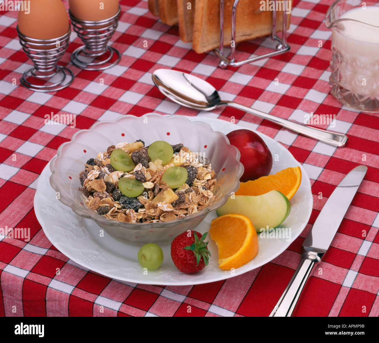 Breakfast Muesli fresh fruit milk toast boiled eggs Stock Photo - Alamy