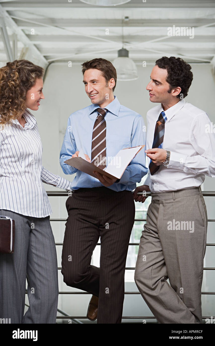 Office workers discussing work Stock Photo - Alamy