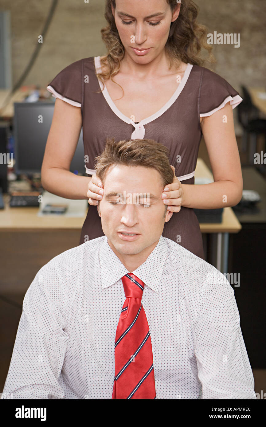 Massaging colleague hi-res stock photography and images - Alamy