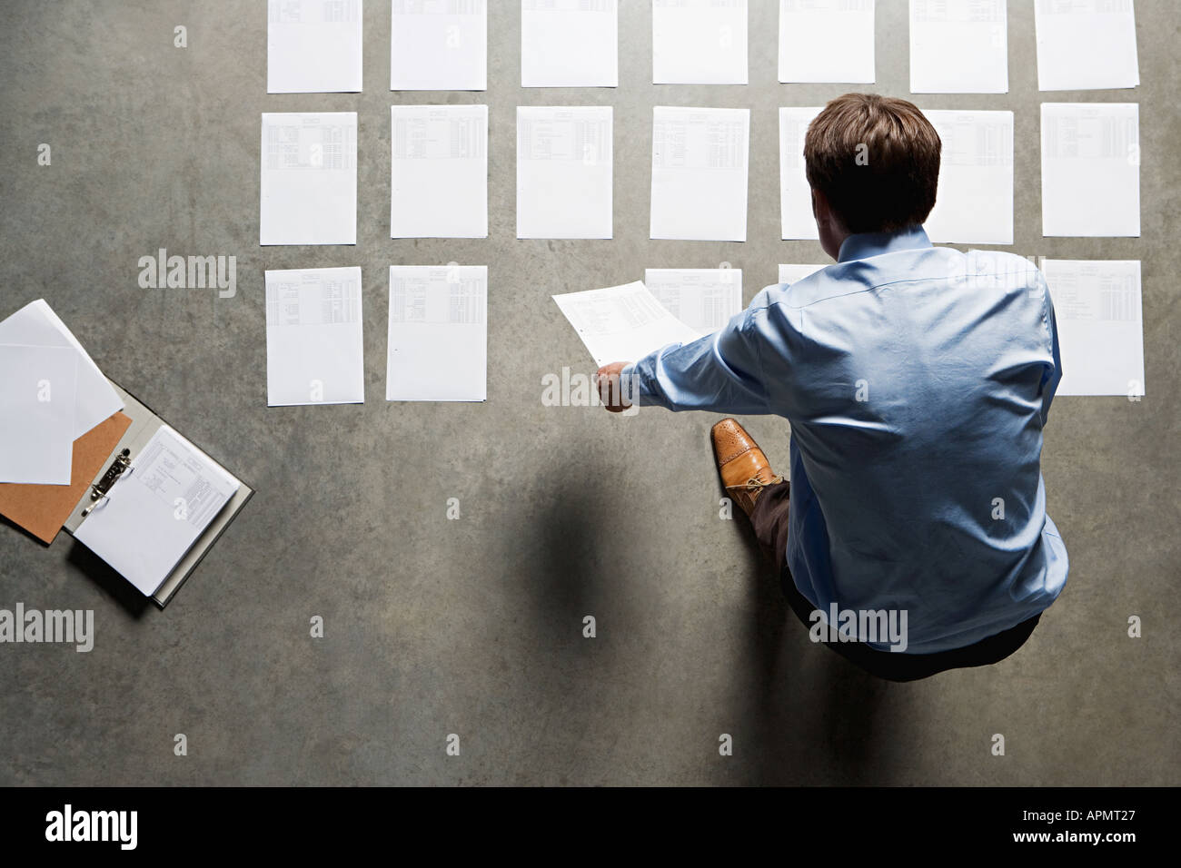 Male bending over placing hi-res stock photography and images - Alamy