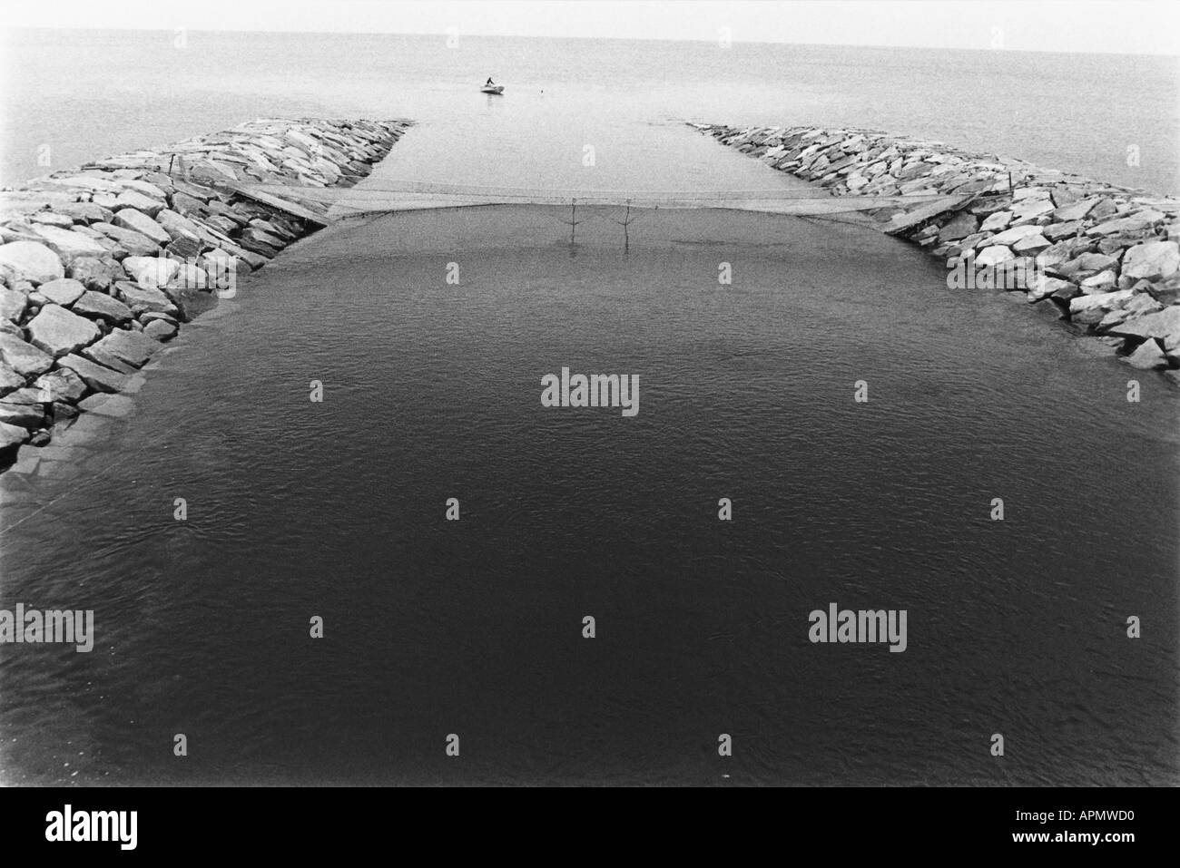 Water inlet leading out to sea Stock Photo - Alamy