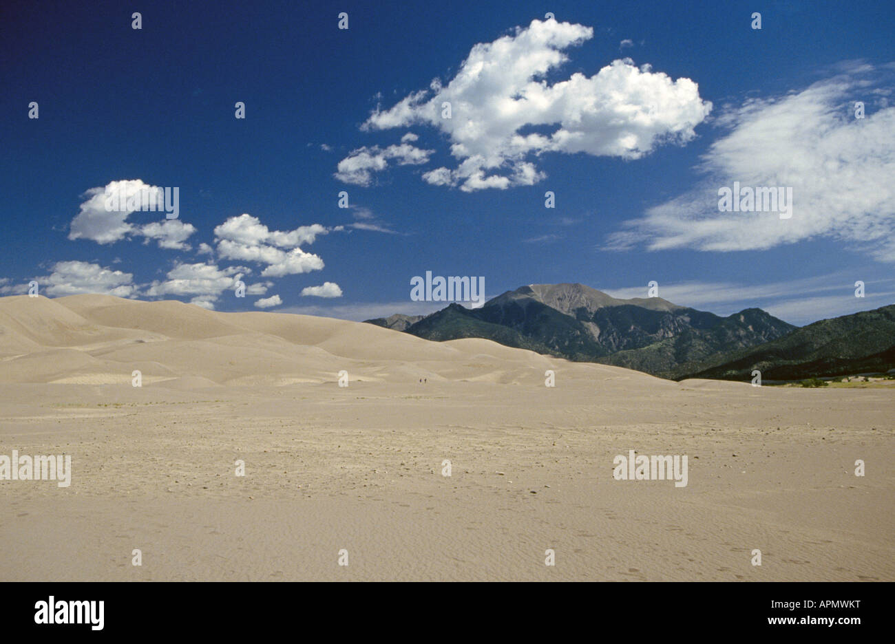 A view of the Rocky Mountains and Great Sand Dunes National Monument in ...