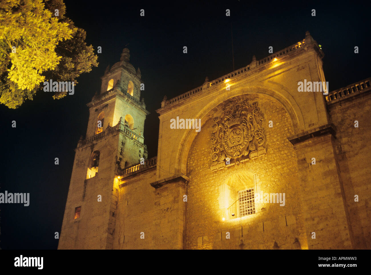 Detail of the massive facade of the Merida Cathedral with lights ...