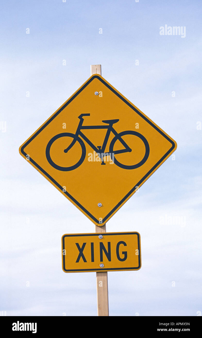A bicycle crossing sign on an urban street Stock Photo - Alamy