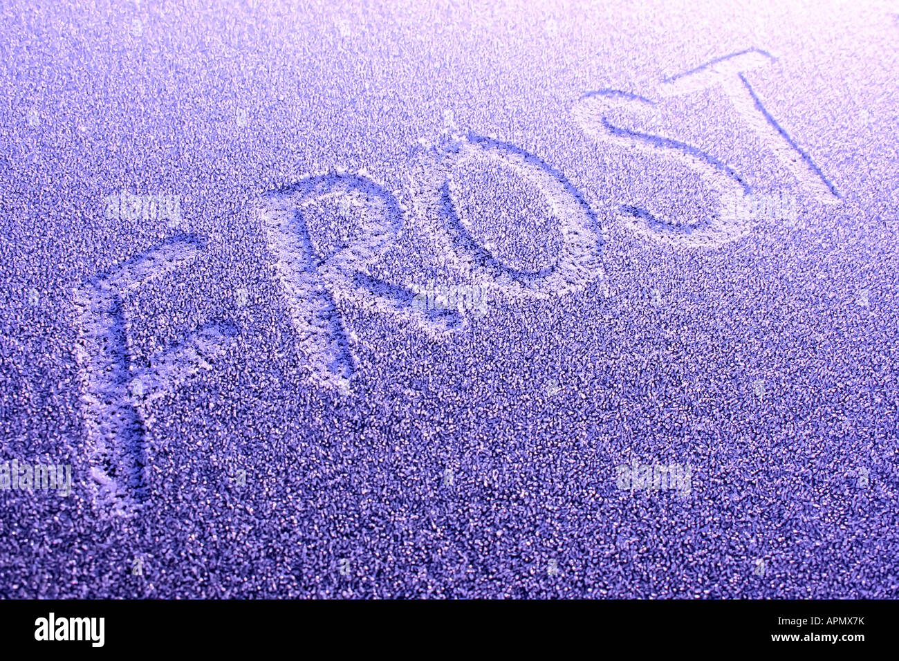 'Frost' written with finger in frost on car roof Stock Photo - Alamy
