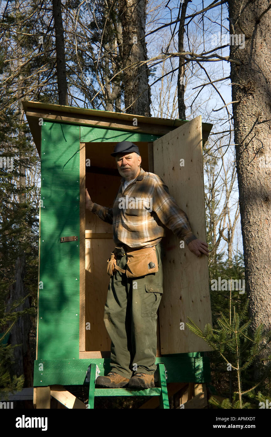 elderly man on his hunter cache Stock Photo - Alamy