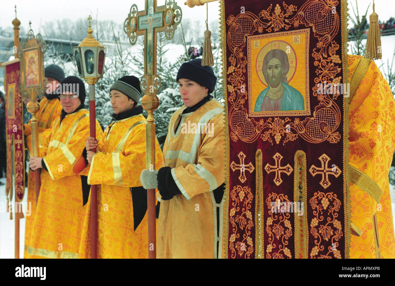 Priests holding sacred flags. Religious procession in Epiphany Day ...