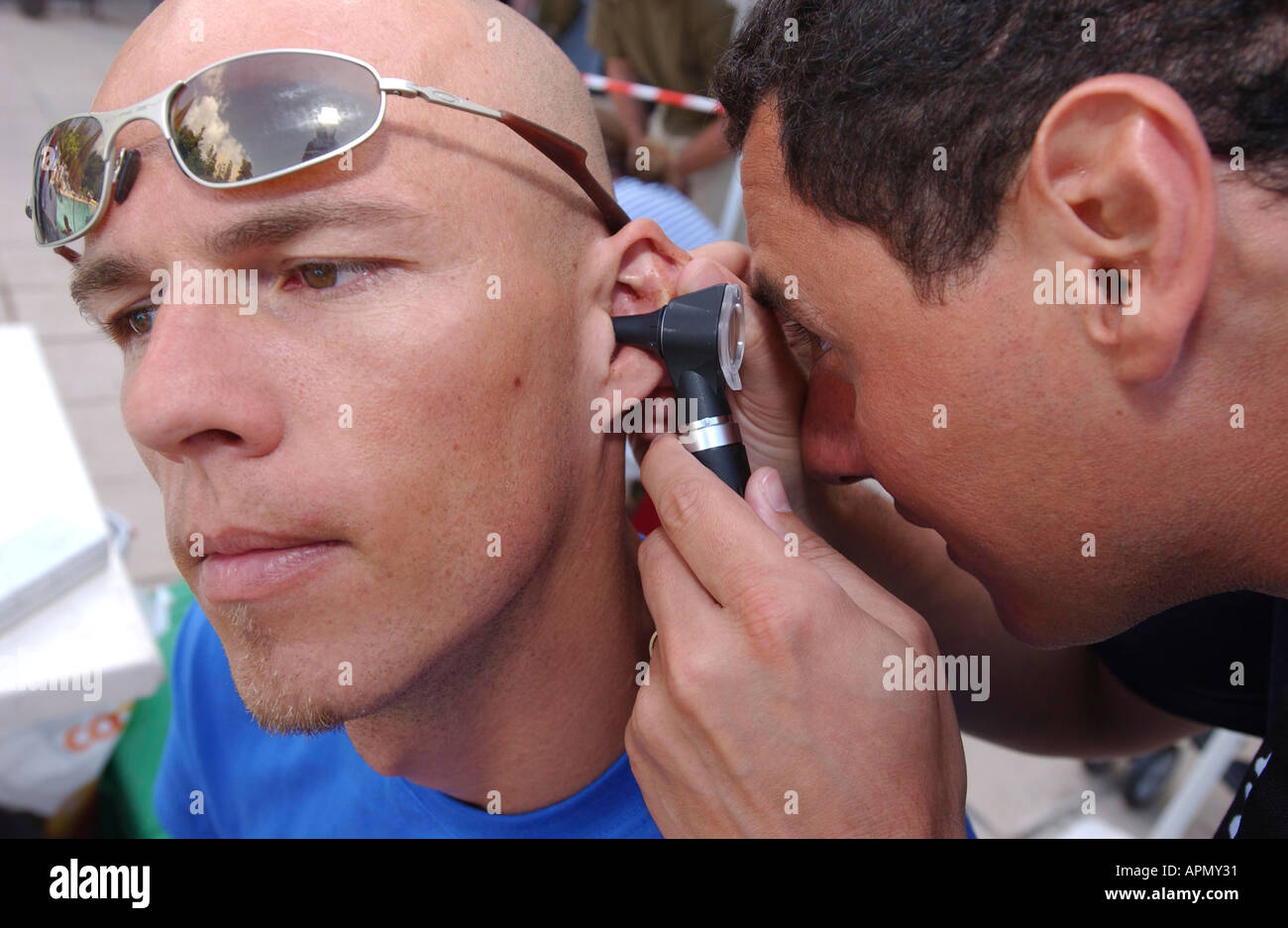FREEDIVER GETTING A MEDICAL IN THE EAR CHECK UP Stock Photo - Alamy