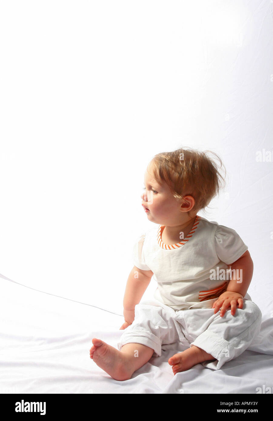 Baby looking left hi-res stock photography and images - Alamy