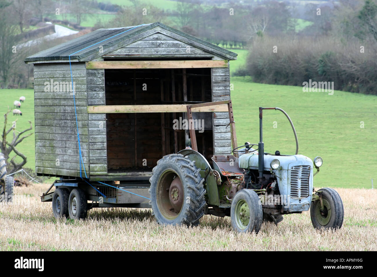 Tractor and makeshift trailer in field near Katesbridge, County Down ...