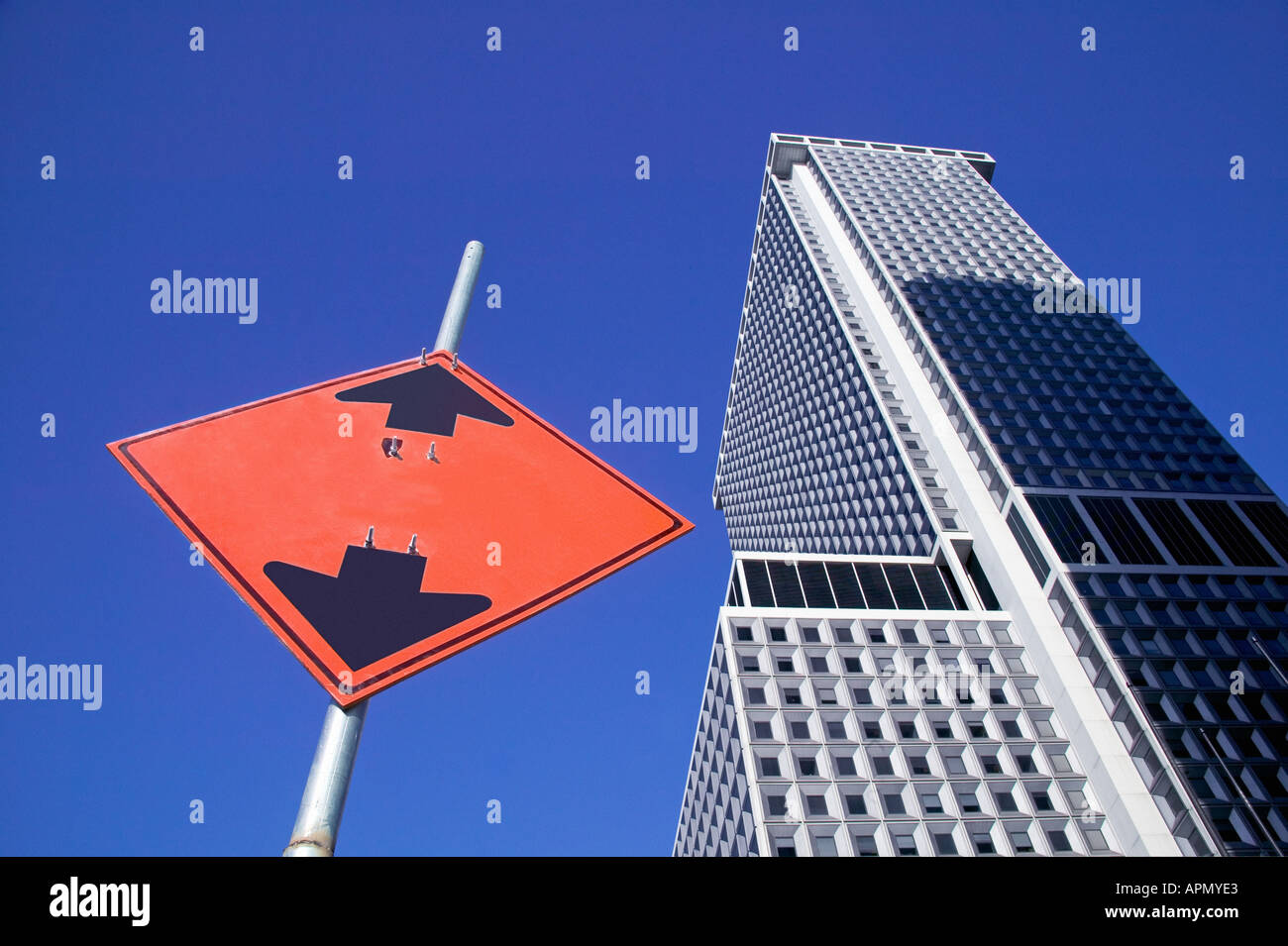 Road sign and skyscraper Stock Photo - Alamy