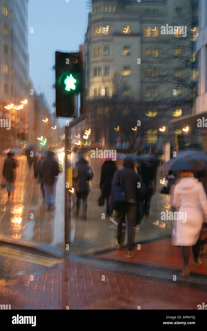 Early Morning city commute in the rain Stock Photo - Alamy