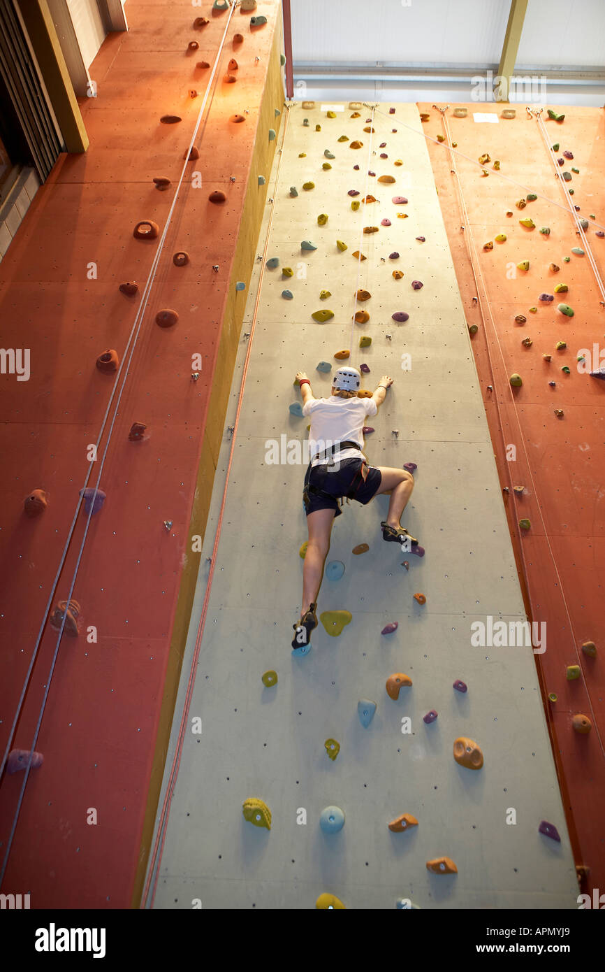 Climber training on indoor climbing wall Stock Photo - Alamy