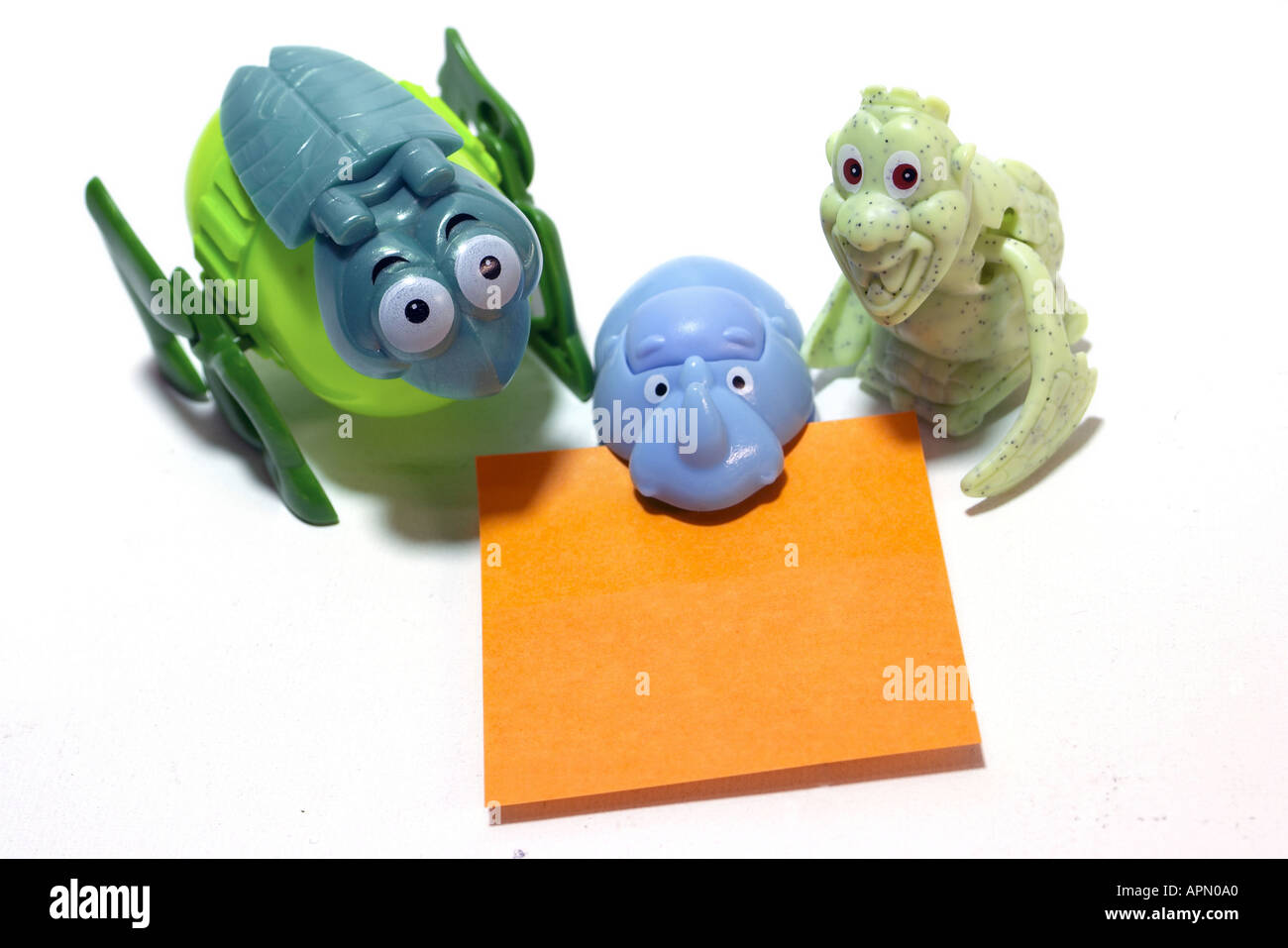 plastic toy holds message Stock Photo - Alamy