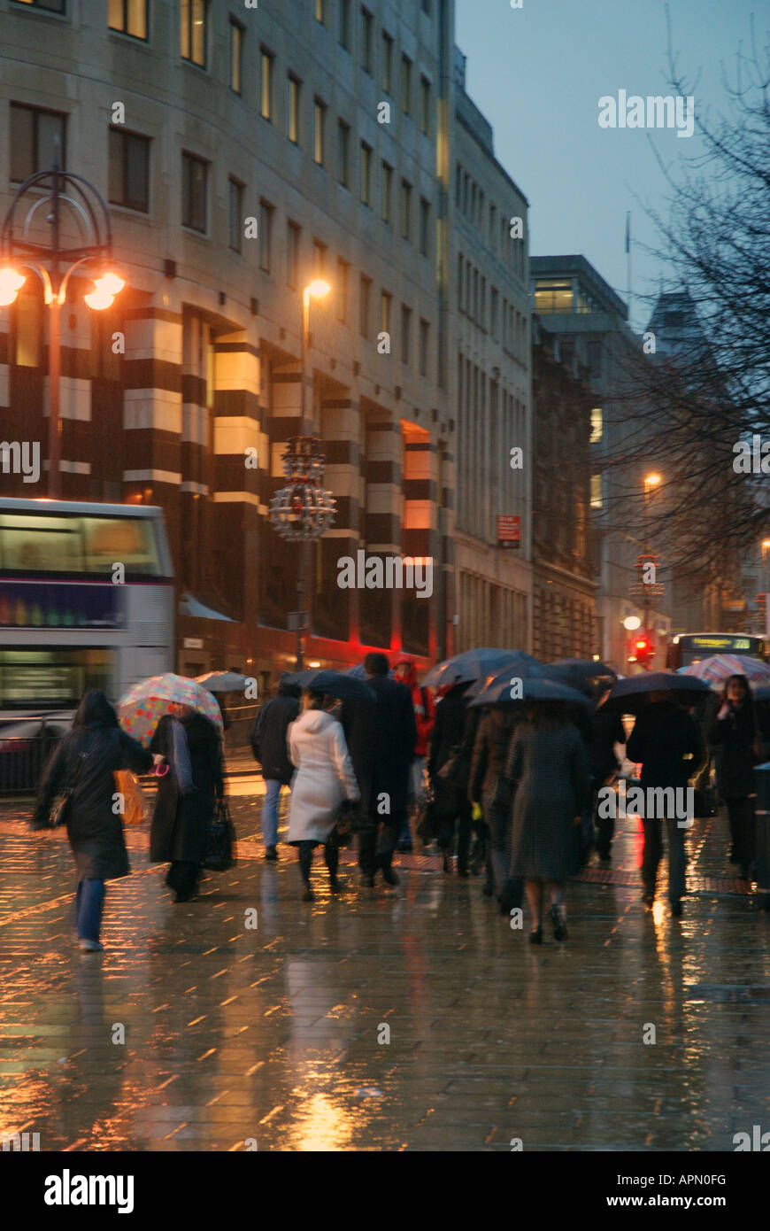 Early Morning city commute in the rain Stock Photo - Alamy