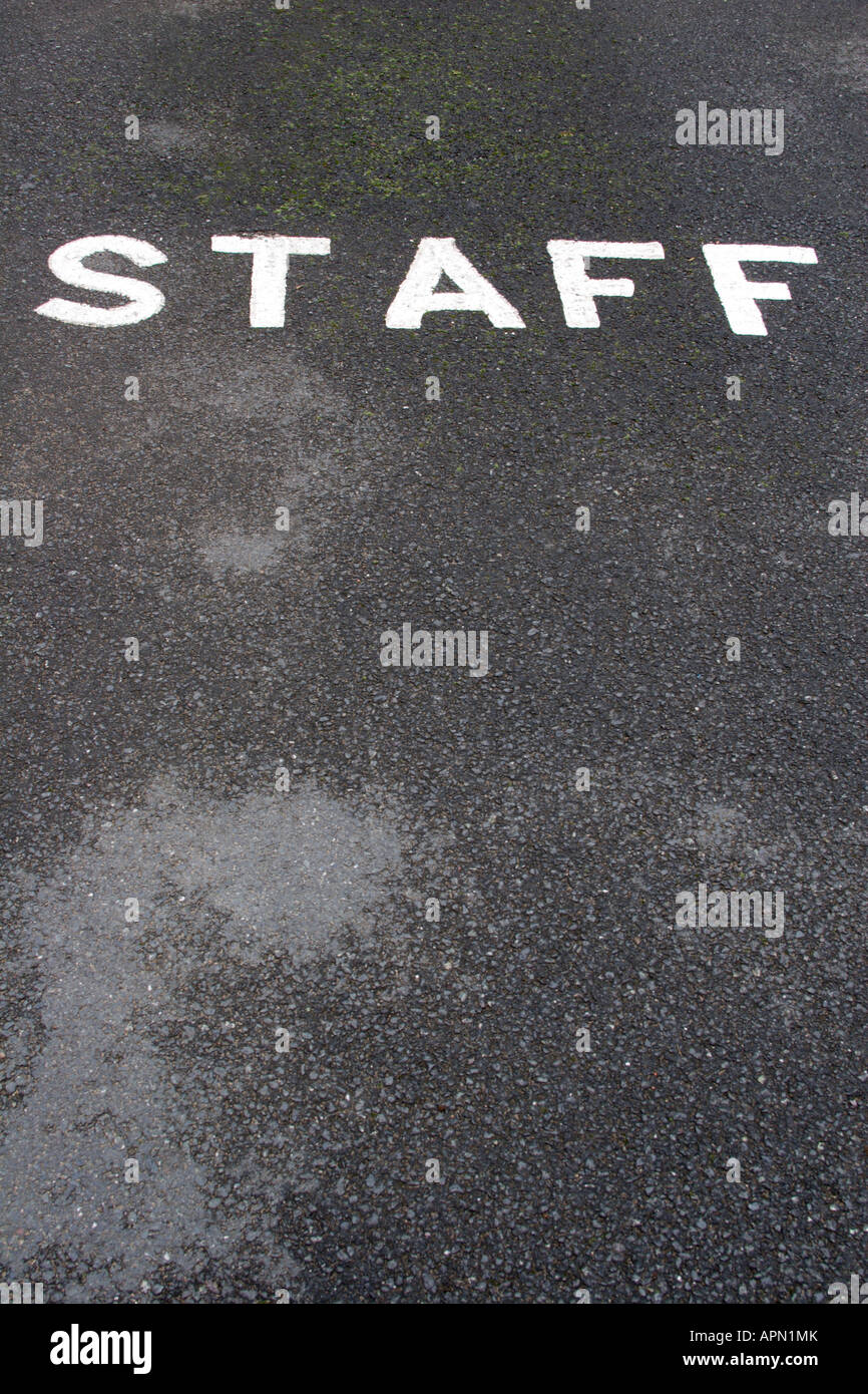 Staff sign on tarmac in car park England UK Stock Photo - Alamy