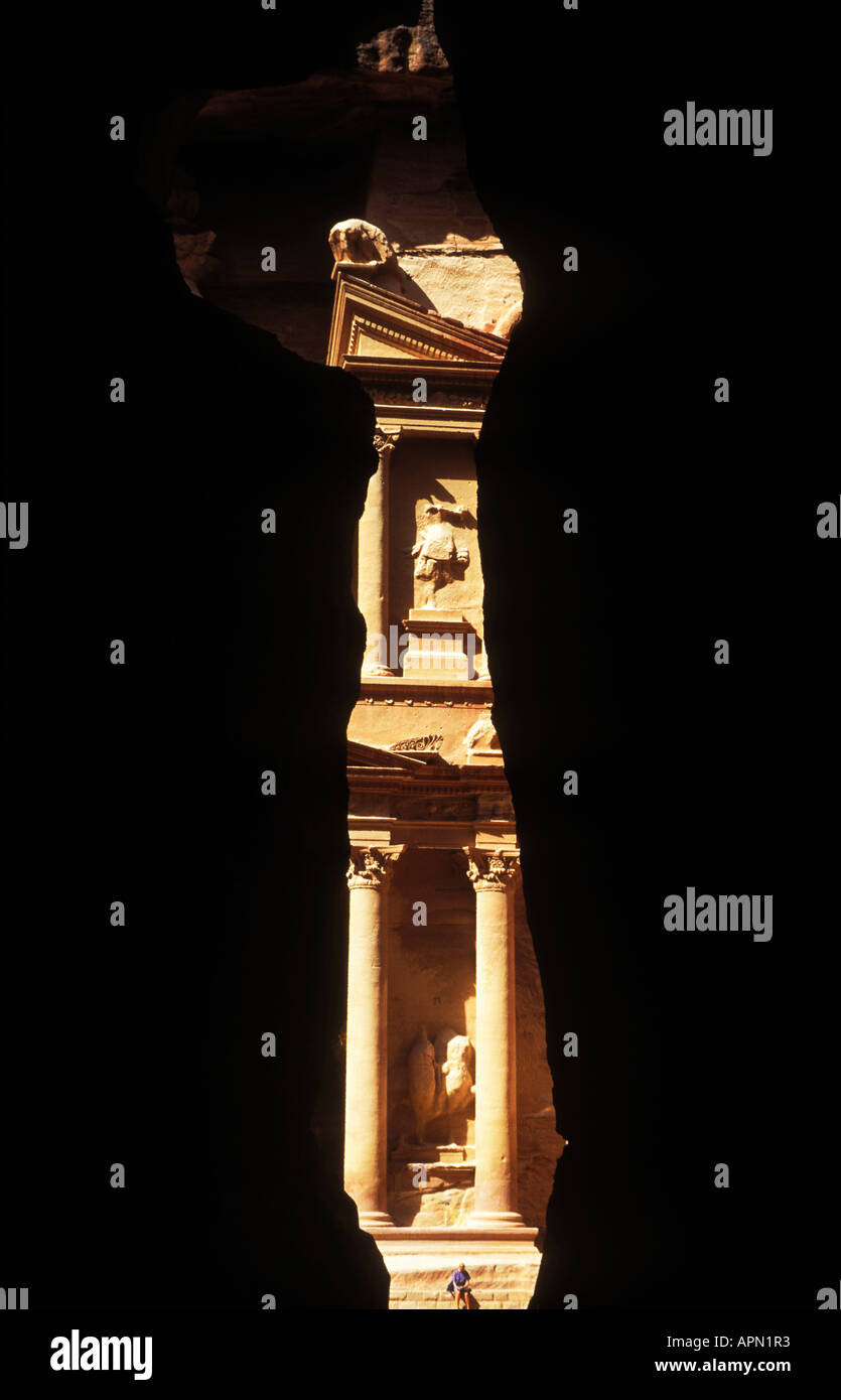 A keyhole view through a fissure in the rock at the building at Petra ...