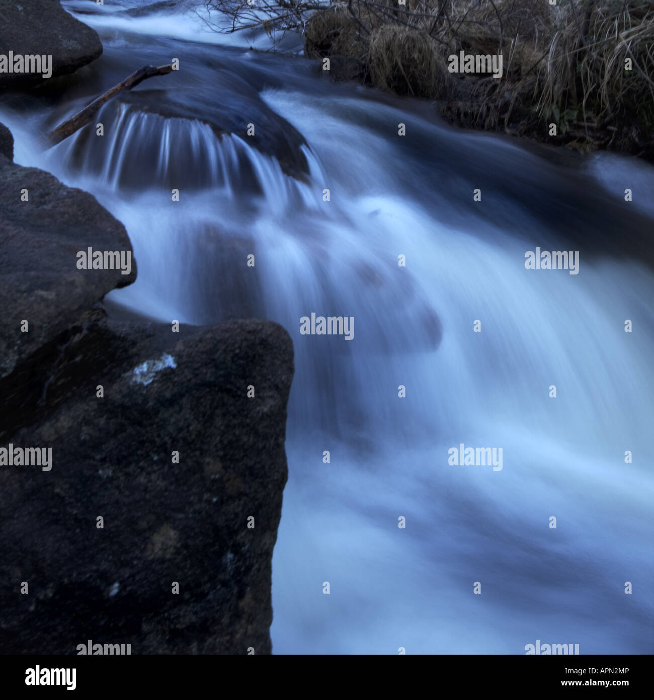 Small stream with high waterflow Stock Photo - Alamy