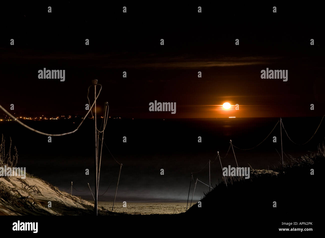 This is a shot of the moon setting over the Monterey Bay Stock Photo ...