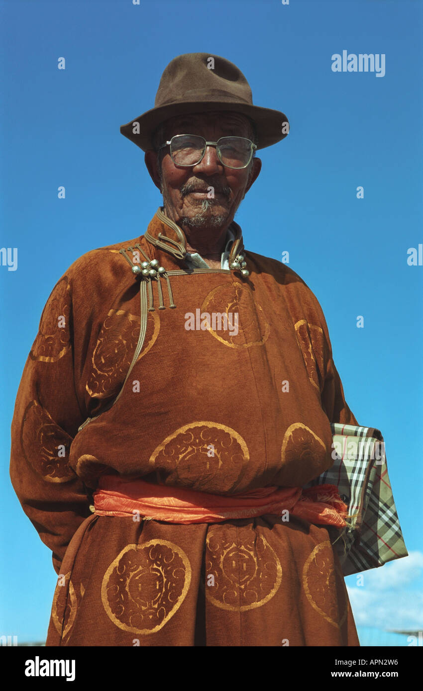 Old man in national robe called del put with silk sash. Khovd city ...