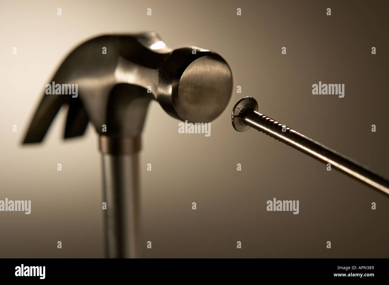 Hitting the Nail on the Head Hammer Concept Stock Photo - Alamy