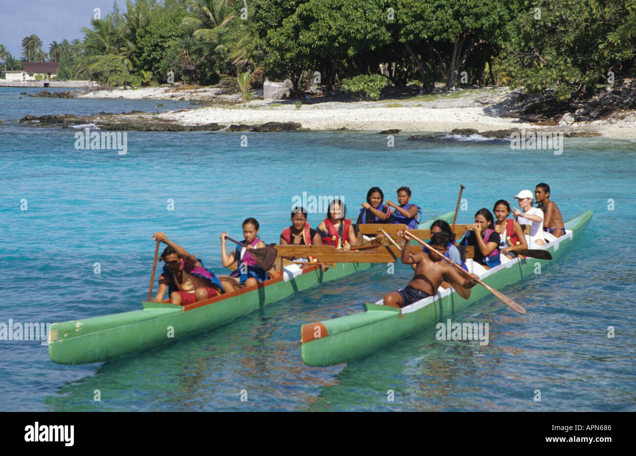 Catamaran with boarding school kids from outlying islands in Rangiroa ...