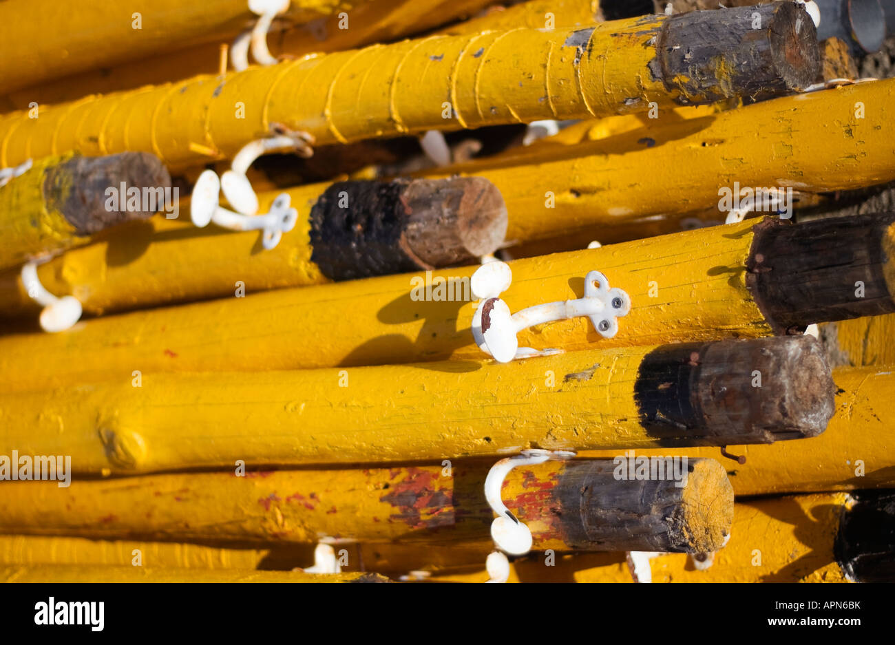 Yellow Beach Poles Stock Photo - Alamy