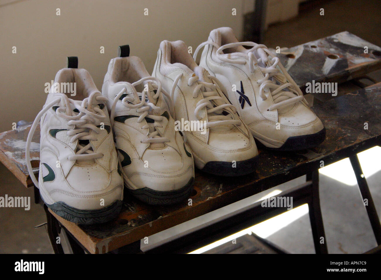 shoes sitting on a work bench Stock Photo - Alamy