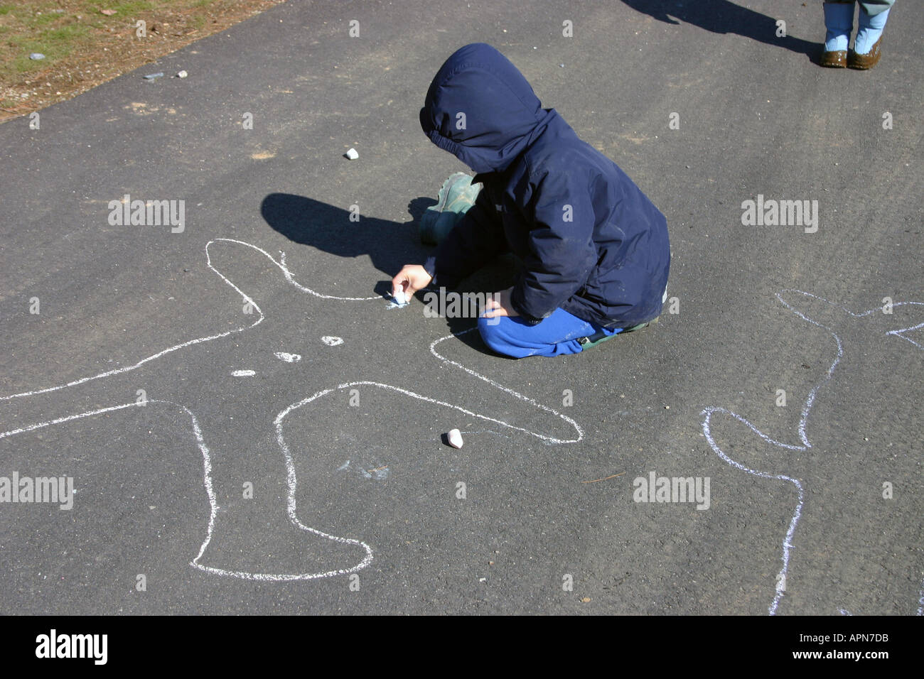 child drawing person in chalk Stock Photo - Alamy