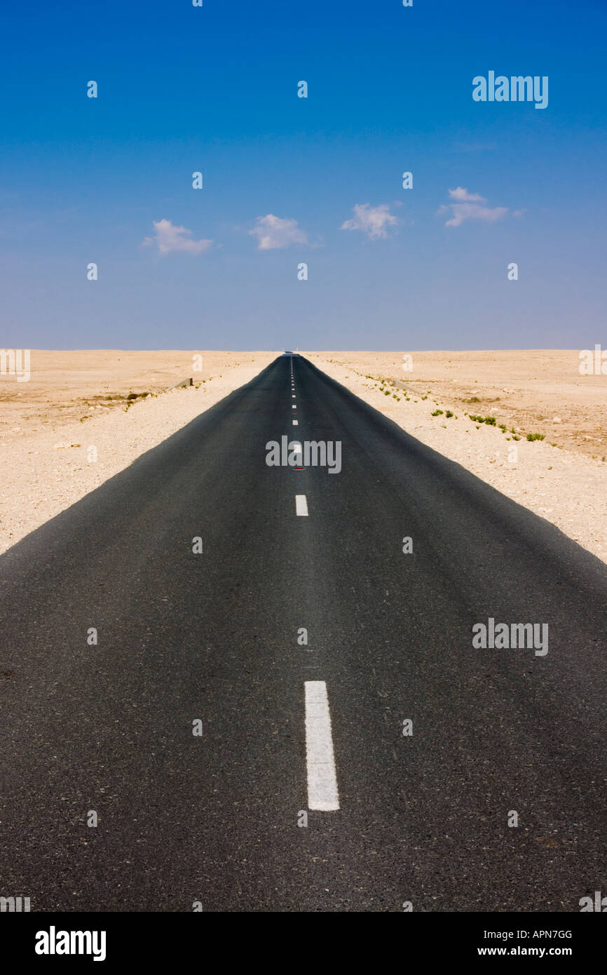 Middle east Qatar desert road Stock Photo - Alamy