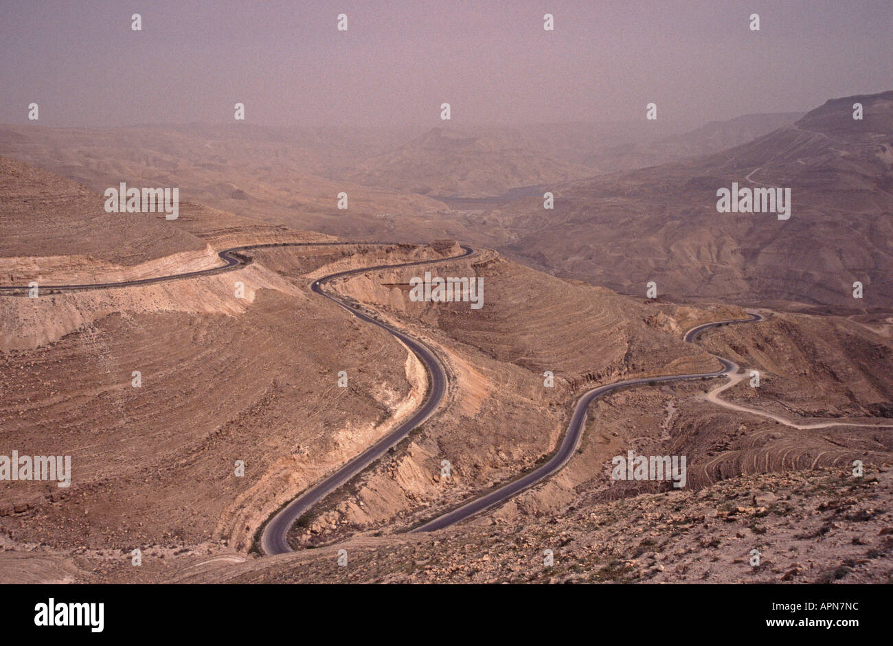 JORDAN The King's Highway winds its way through the desert at Wadi ...