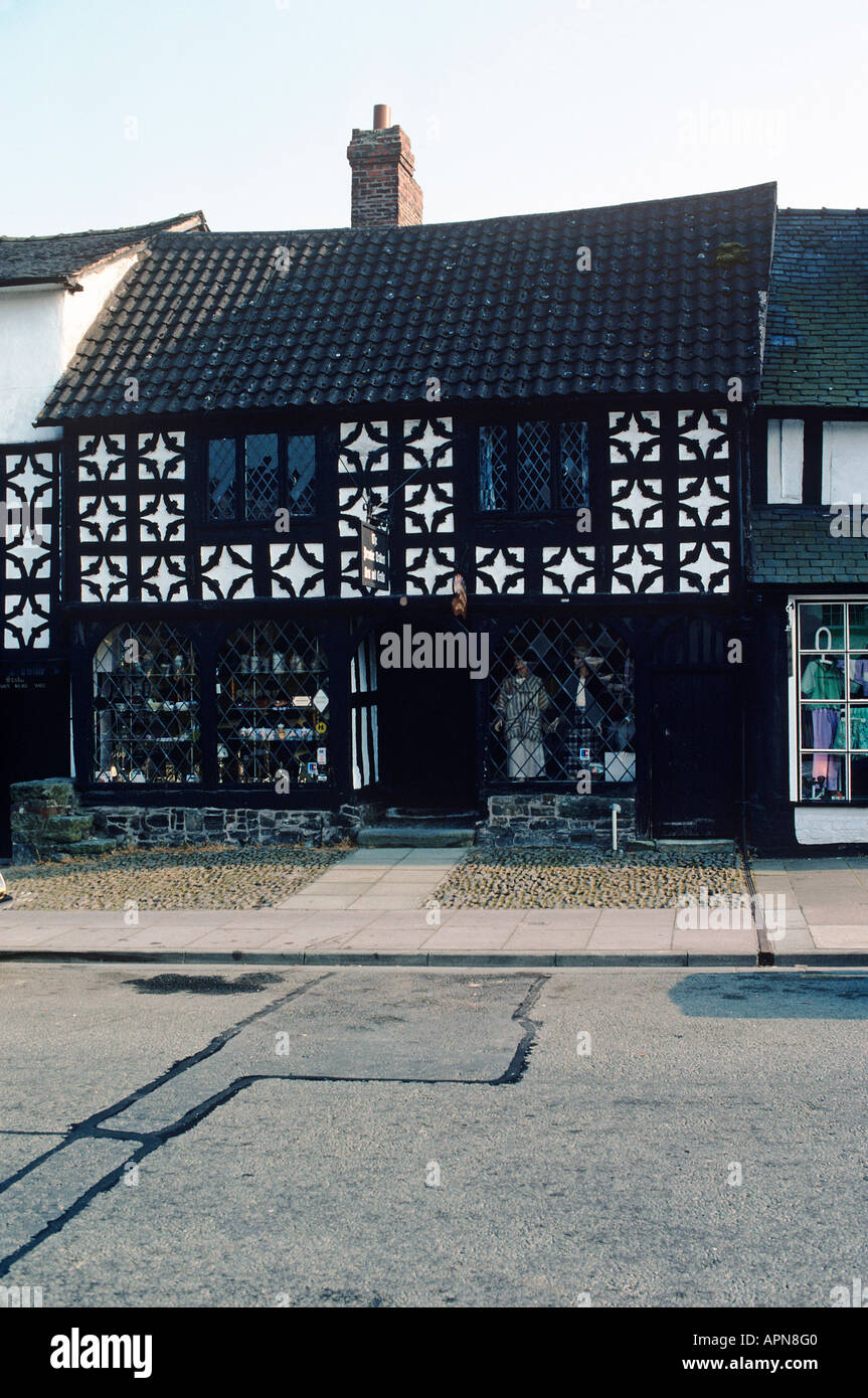A half timbered building in Welshpool now serves as a shop Stock Photo ...
