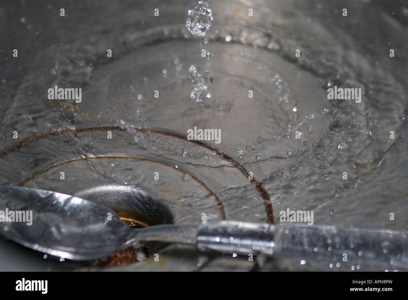 Water drop from tap in hi-res stock photography and images - Alamy