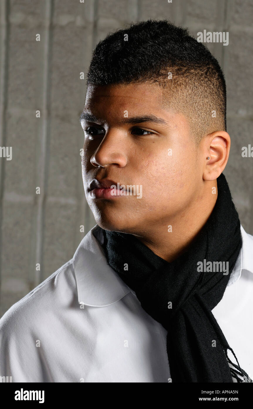 Young black man close up with scarf looking proud Stock Photo - Alamy