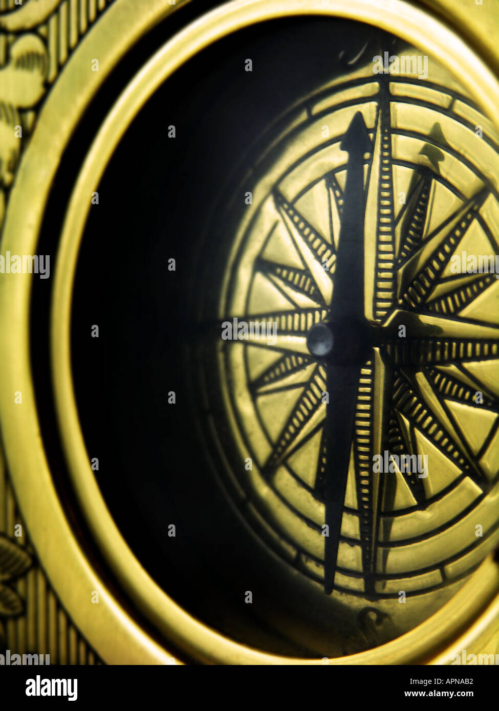 Gold compass pointing north hi-res stock photography and images - Alamy