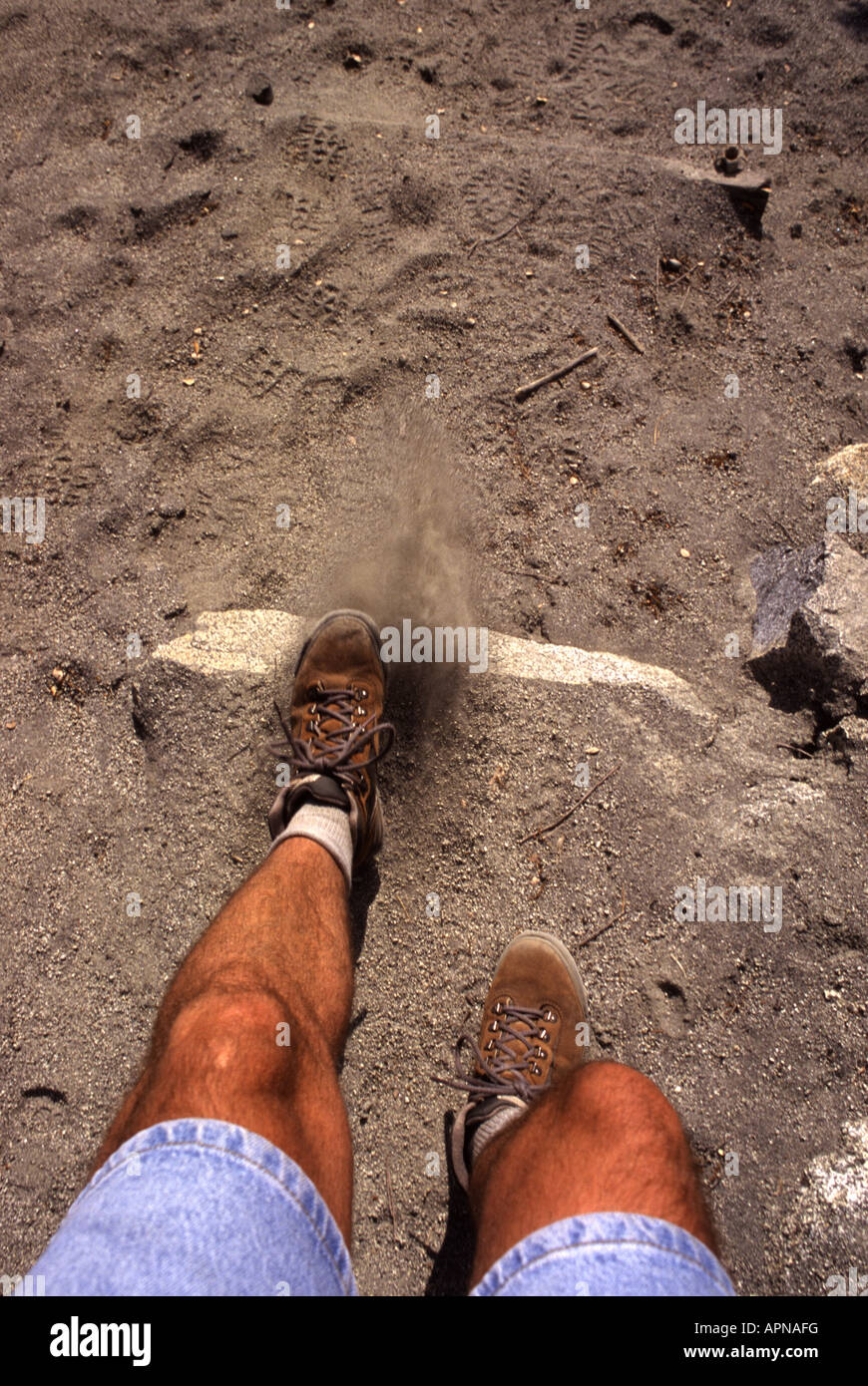 subjective perspective of legs in hiking boots walking Stock Photo - Alamy