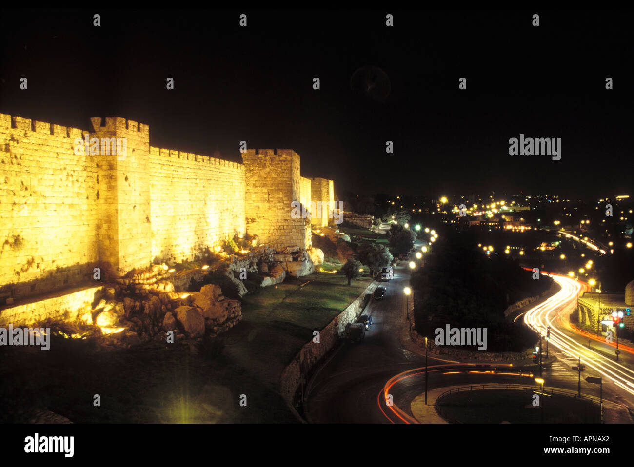 Illuminated at night a section of the crenellated walls built by ...