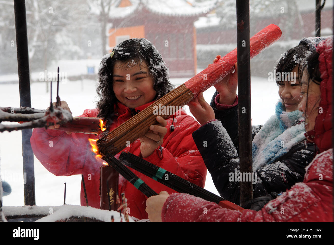 Praying in Qi Xia temple near Nanjing during a big winter snowstorm ...