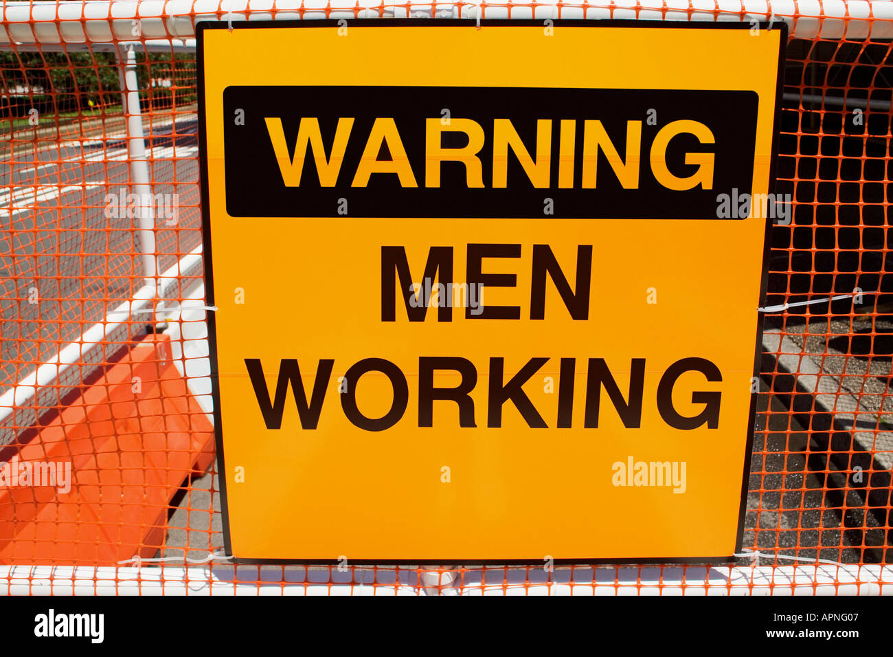 Warning men working Stock Photo - Alamy