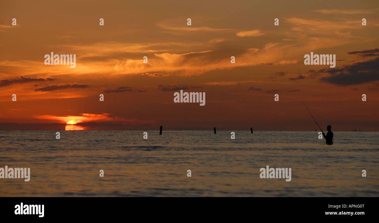 Fishing at Sunset Stock Photo - Alamy