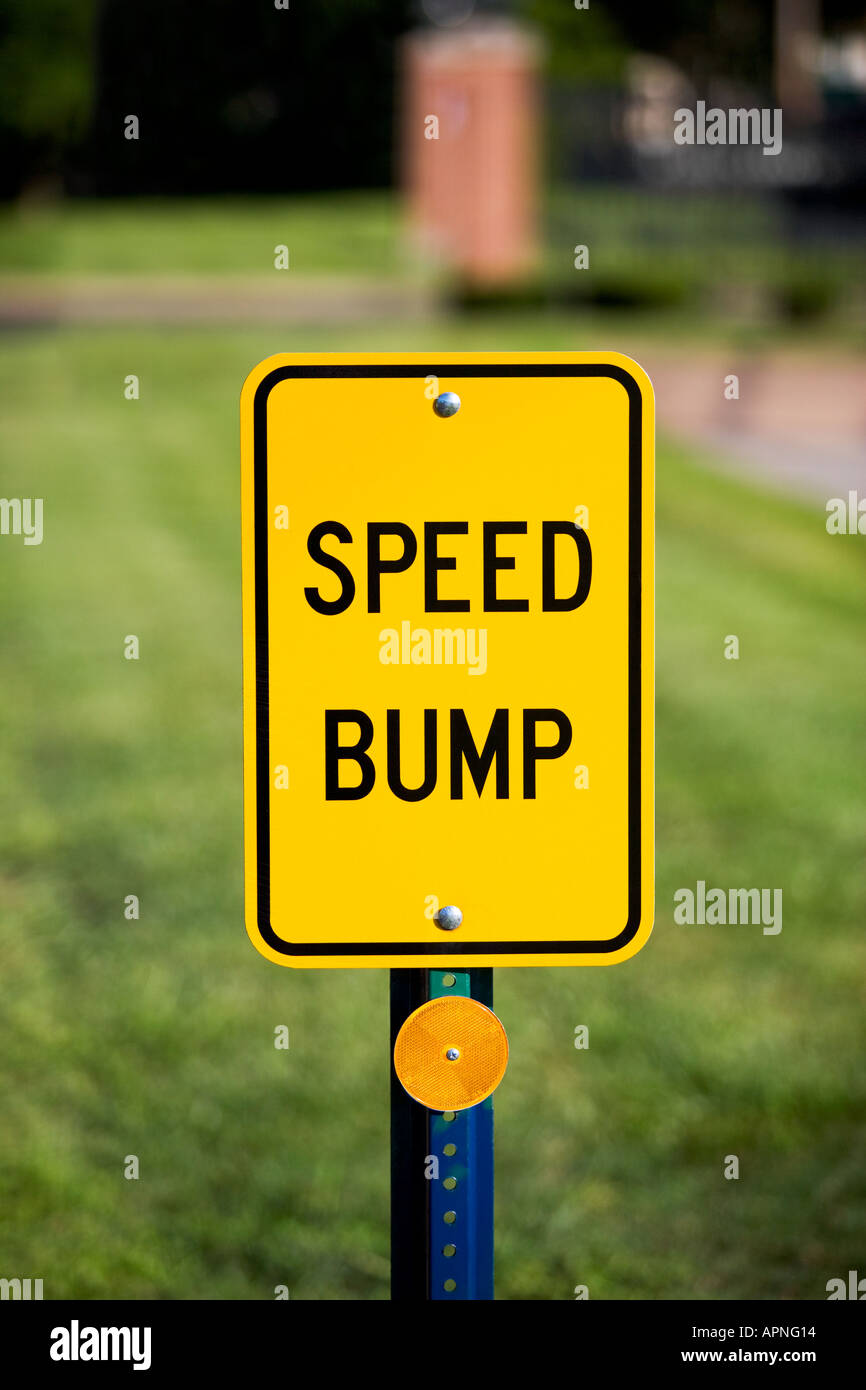 Speed bump sign Stock Photo - Alamy