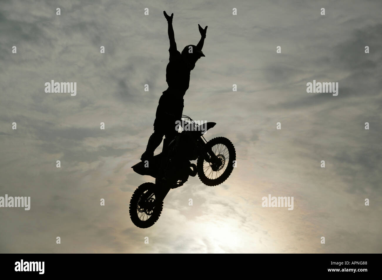Motocross action, backlit mid air stunt, London Stock Photo - Alamy