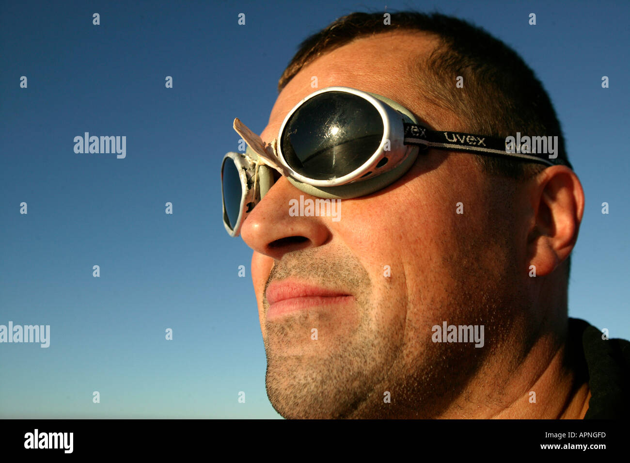 Man with goggles hi-res stock photography and images - Alamy
