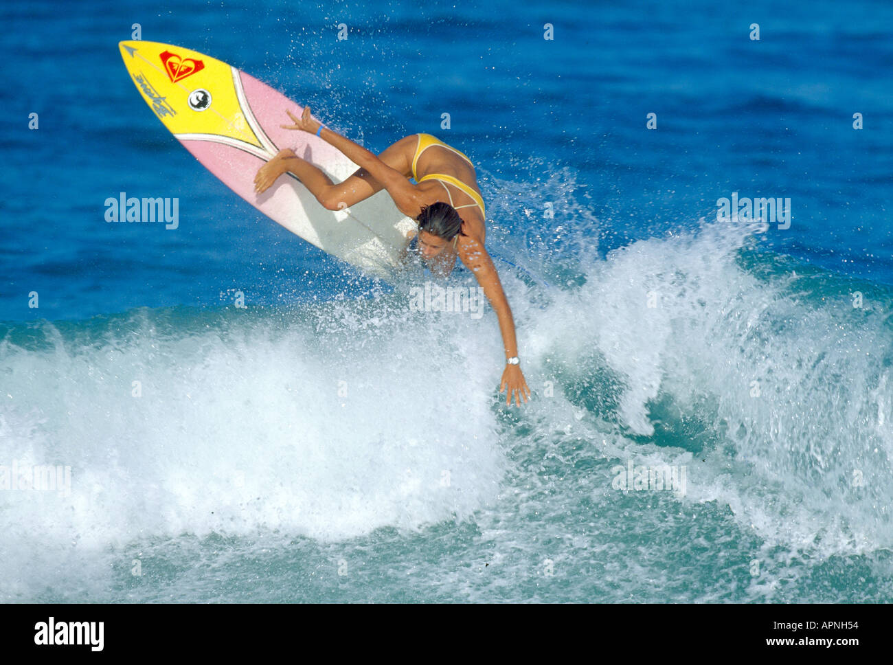 SURFING GIRL WOMAN ACTION Stock Photo - Alamy